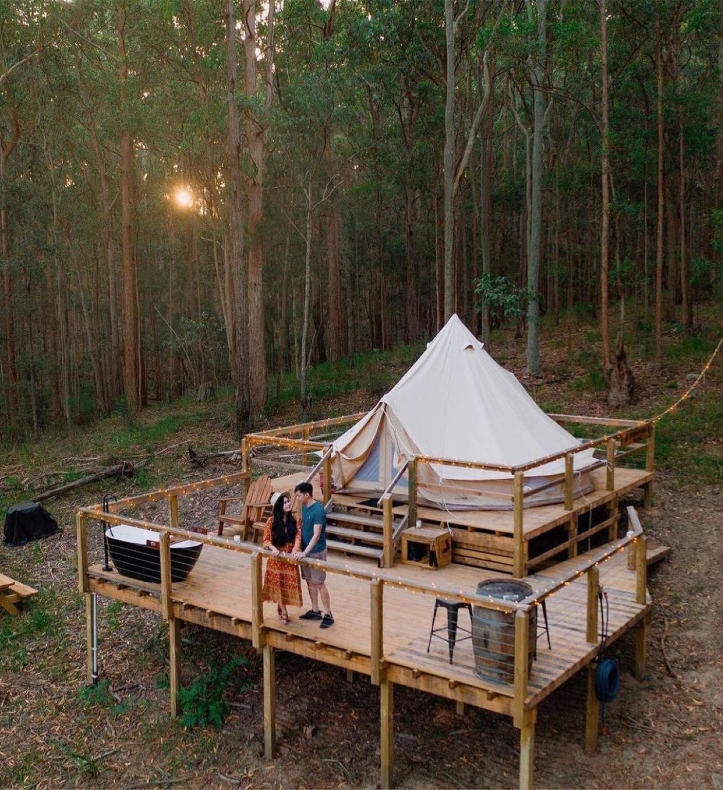 Embracing Nature's Luxury: Glamping on a Bell Tent Wooden Platform ...